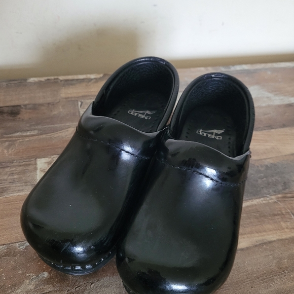 Dansko | Shoes | Dansko Shiny Black Leather Slipons Clogs For Kids ...